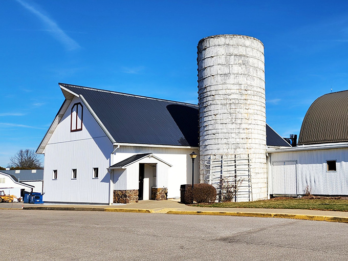 The iconic white barn exterior stands proudly against blue Ohio skies, complete with its towering silo&mdash;a beacon for hungry travelers seeking comfort food paradise.