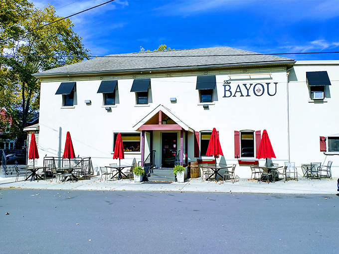 The unassuming white exterior of The Bayou might not stop traffic, but those bright red umbrellas are like little flags signaling "deliciousness happens here."