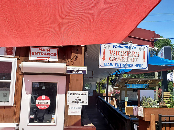 The red awning beckons like a seafood siren song, promising treasures within. Wicker's unpretentious entrance sets the perfect stage for seafood authenticity.