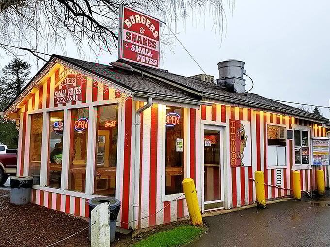The candy-striped wonderland of Small Fryes stands like a beacon of comfort food in Fall City, promising delicious simplicity under those weeping willows.