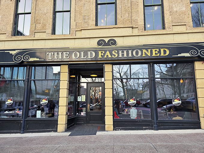 The Old Fashioned stands proudly on Madison's Capitol Square, a historic building that seems to whisper, "Come inside, we have cheese waiting for you."