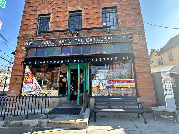 The historic brick facade of Zingerman's stands proudly on the corner, like a culinary lighthouse beckoning hungry souls to safe harbor.