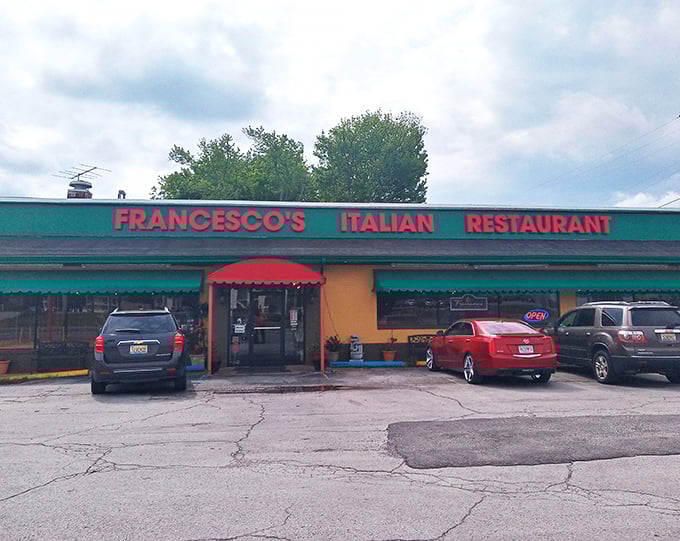The cheerful yellow exterior with its red and green awnings isn't just inviting&mdash;it's practically shouting "authentic Italian food inside!" like a culinary town crier.