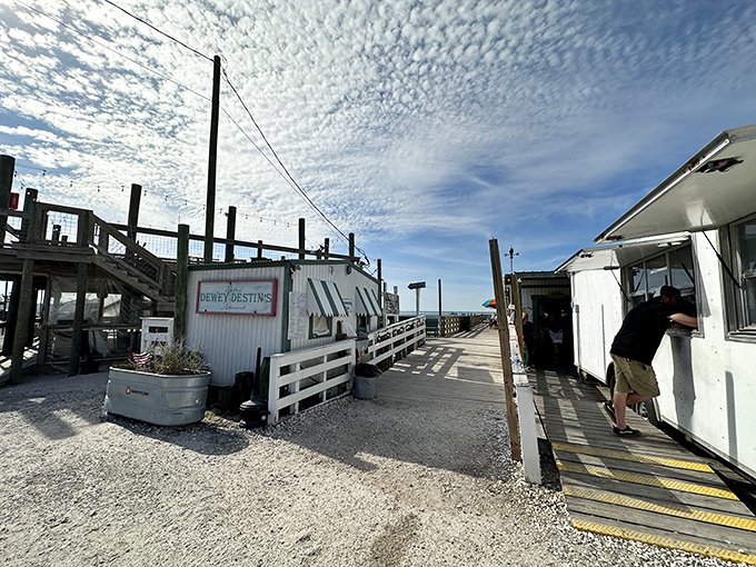 The entrance to seafood paradise isn't paved with gold—it's a humble wooden dock leading to Florida's most authentic maritime feast.
