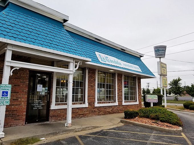 That distinct turquoise roof isn't just eye-catching&mdash;it's a beacon for pasta pilgrims. La Gondola's humble exterior hides culinary treasures worth discovering.