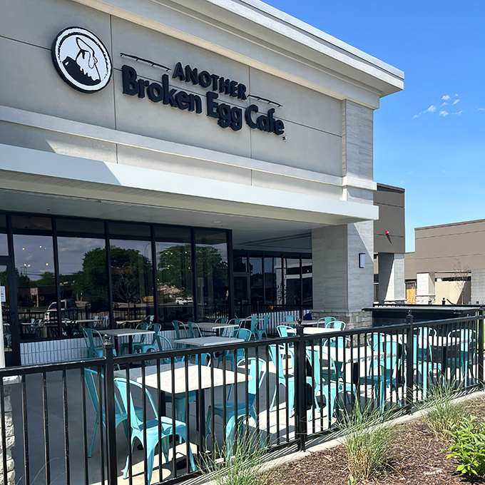The gleaming exterior of Another Broken Egg Cafe stands out in Prairie Village like a beacon calling breakfast enthusiasts home.