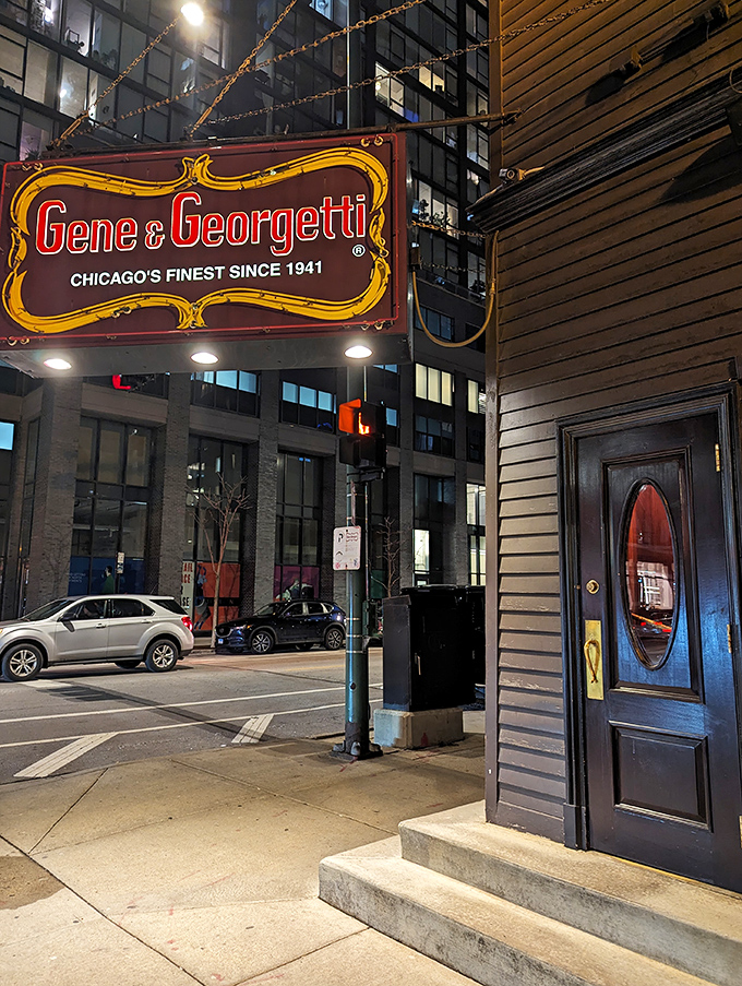 The iconic red and gold sign beckons like a lighthouse for steak lovers. Chicago's culinary history hangs right there on Franklin Street.