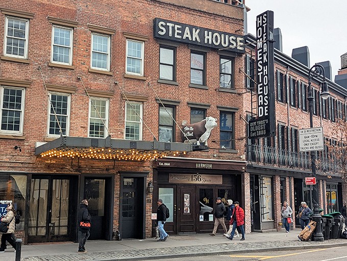 The historic brick facade of Old Homestead stands like a carnivore's beacon in the Meatpacking District. Those vintage lights have illuminated countless memorable evenings.