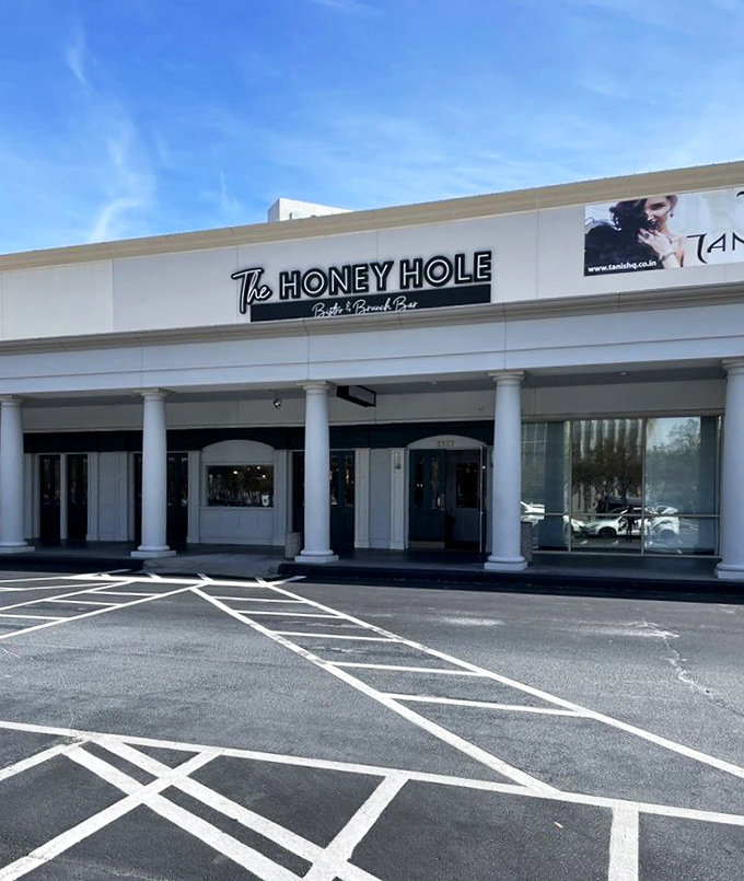 The unassuming storefront belies the culinary treasures within. Like finding a secret speakeasy, but instead of bootleg whiskey, you get life-changing shrimp and grits.