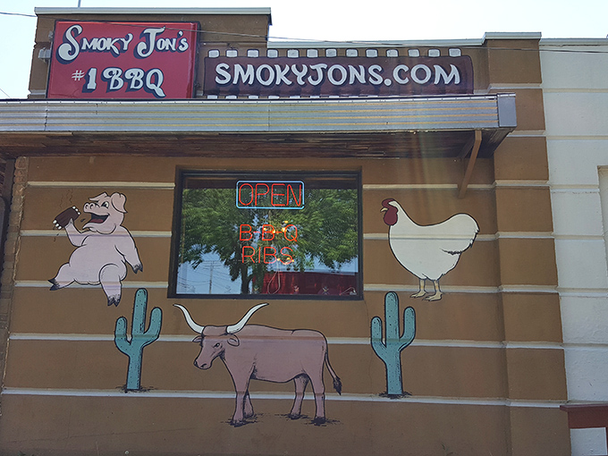 The unassuming exterior of Smoky Jon's proudly declares itself "Madison's All-Time BBQ King" &ndash; a bold claim backed by decades of smoke-infused excellence.