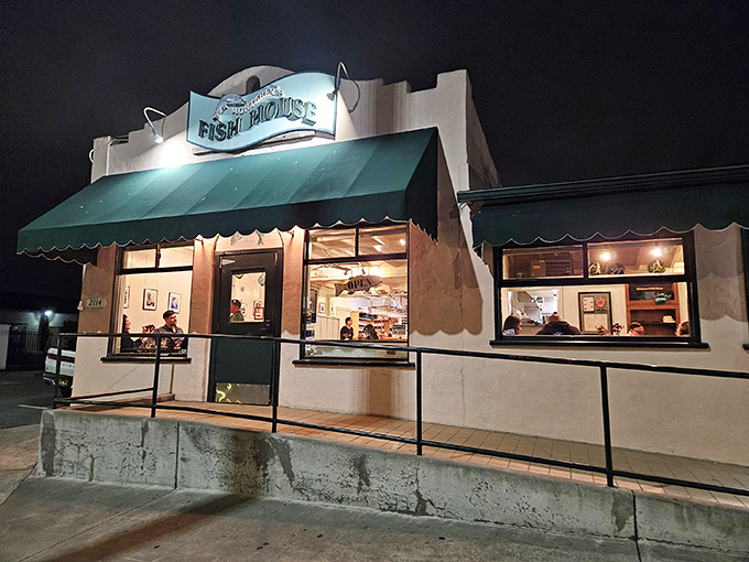 The unassuming exterior of Monterey's Fish House glows with promise at dusk, like a lighthouse beckoning hungry sailors home.