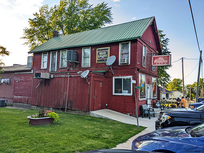 The weathered red exterior with its green roof isn't trying to impress anyone&mdash;it's saving all that energy for what's happening in the kitchen. 