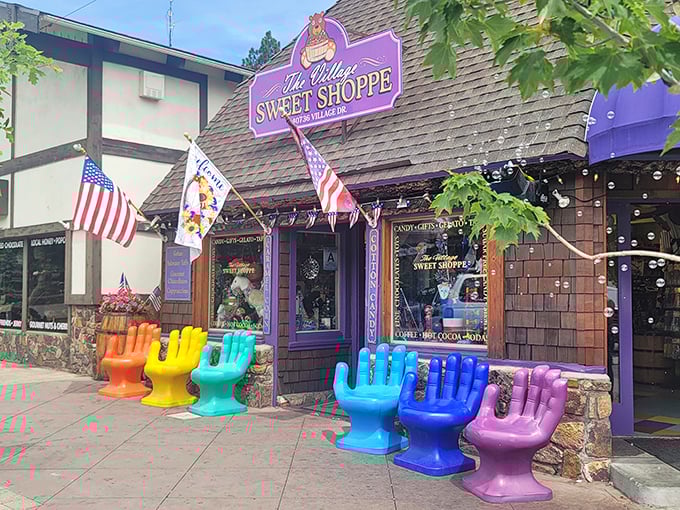 Those colorful hand-shaped chairs aren't just for sitting&mdash;they're your first clue that adulthood's rules about "not playing with your food" don't apply here.