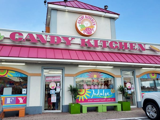 The pink-roofed beacon of sweetness beckons from Coastal Highway, promising a sugar rush that transcends generations.