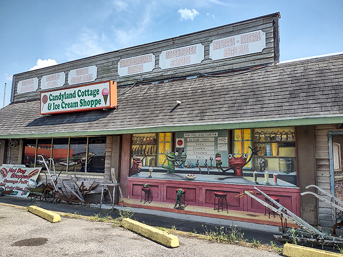 The charming exterior of Candyland Cottage beckons like a sweet mirage in Rayne, promising sugar-fueled nostalgia behind those vintage windows.