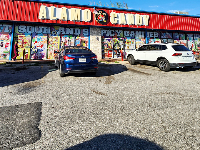 The vibrant red storefront of Alamo Candy Company stands out like a sugar rush waiting to happen. Sweet dreams are made of this!