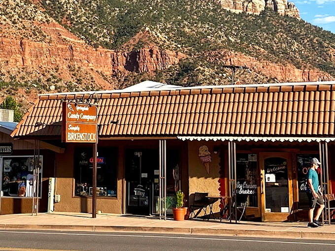 Where red rock majesty meets sweet tooth paradise. Springdale Candy Company's charming storefront sits perfectly framed by Zion's towering cliffs.