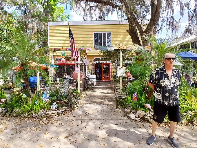 The weathered clapboard exterior and bright red door say "authentic Florida" louder than any tourism brochure ever could. Small-town charm personified.
