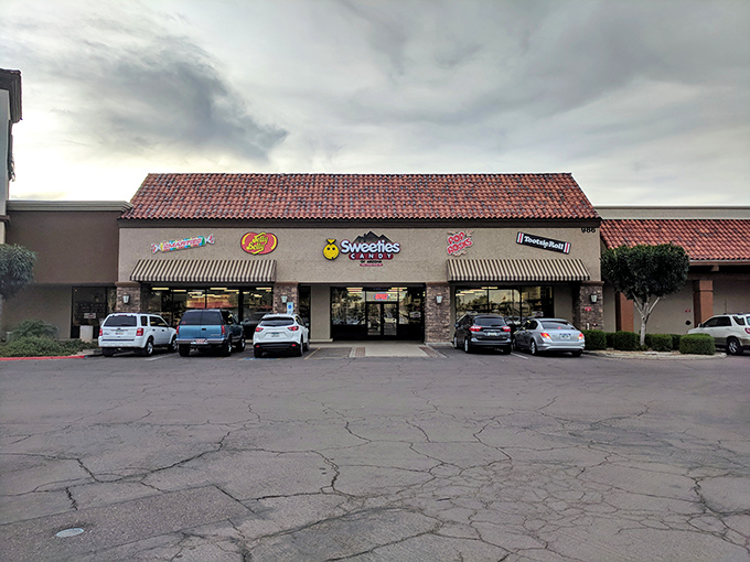 The smiley face logo says it all&mdash;this isn't just a candy store, it's therapy with a sugar rush guarantee.