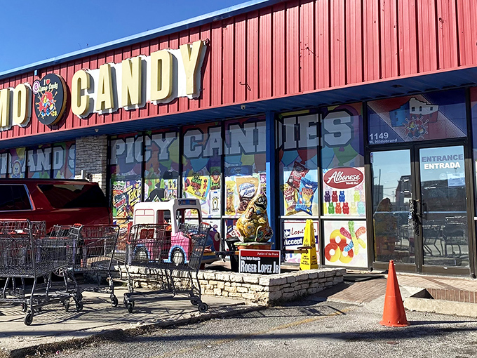 The vibrant red storefront of Alamo Candy Company stands out like a sugar rush waiting to happen. Sweet dreams are made of this!
