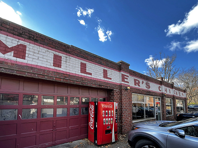 The iconic brick fa&ccedil;ade of Miller's Chicken stands as Athens' monument to comfort food, complete with seasonal poinsettias that say "we care about the details."