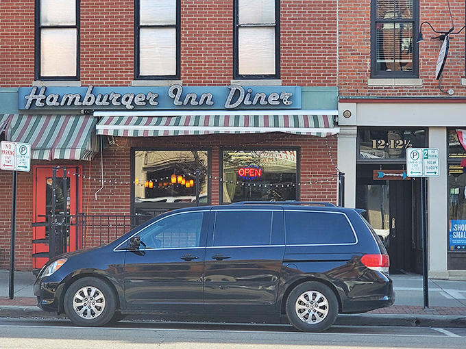 The retro signage of Hamburger Inn Diner beckons like an old friend on Delaware's Winter Street, promising comfort and satisfaction behind that cheery neon glow.