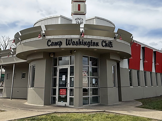 The iconic Art Deco fa&ccedil;ade of Camp Washington Chili stands like a beacon for hungry travelers, its vertical "CHILI" sign a Cincinnati landmark since 1940.