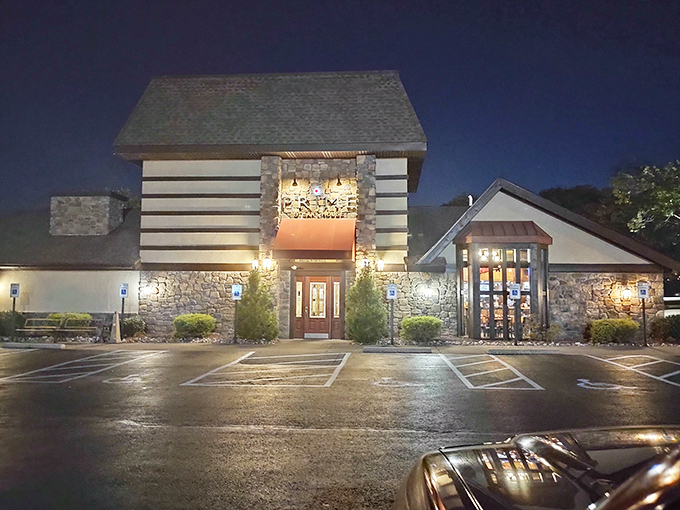 The stone-and-timber exterior of Prime Steak House stands like a carnivore's cathedral, its red awning beckoning hungry pilgrims from across Pennsylvania.