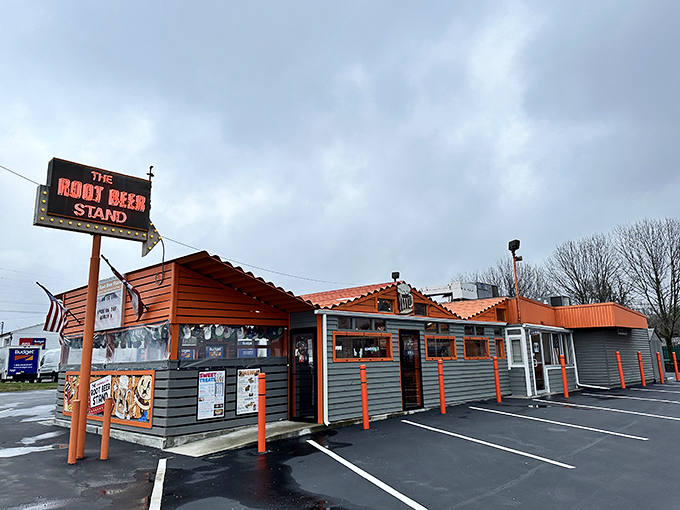 The iconic orange-trimmed exterior stands like a time capsule on Reading Road, its vintage sign promising simple pleasures that never go out of style. 