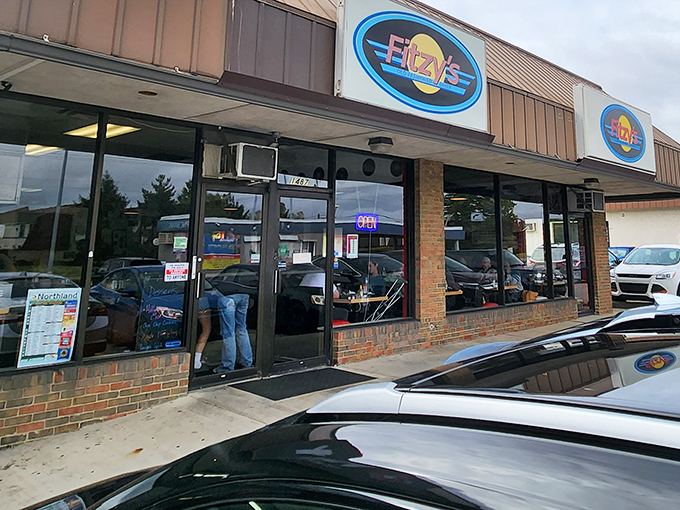 The blue neon sign of Fitzy's beckons like a lighthouse for the breakfast-deprived. This unassuming storefront houses morning magic that locals line up for.
