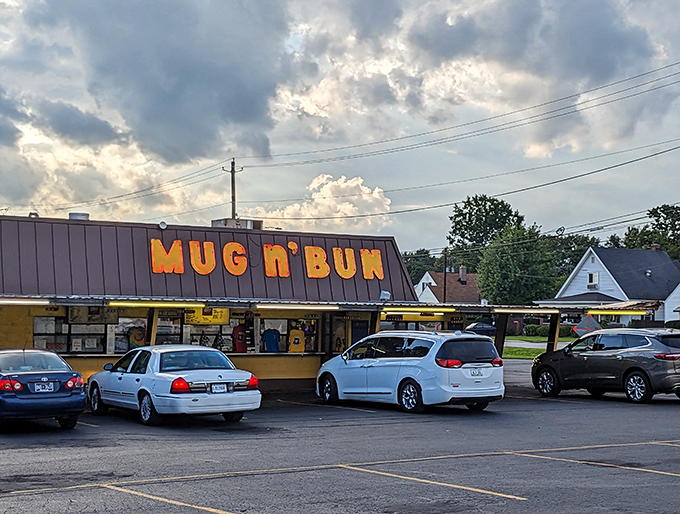 The iconic orange lettering of Mug-n-Bun against the Indiana sky promises a time-traveling culinary adventure that your taste buds won't soon forget.
