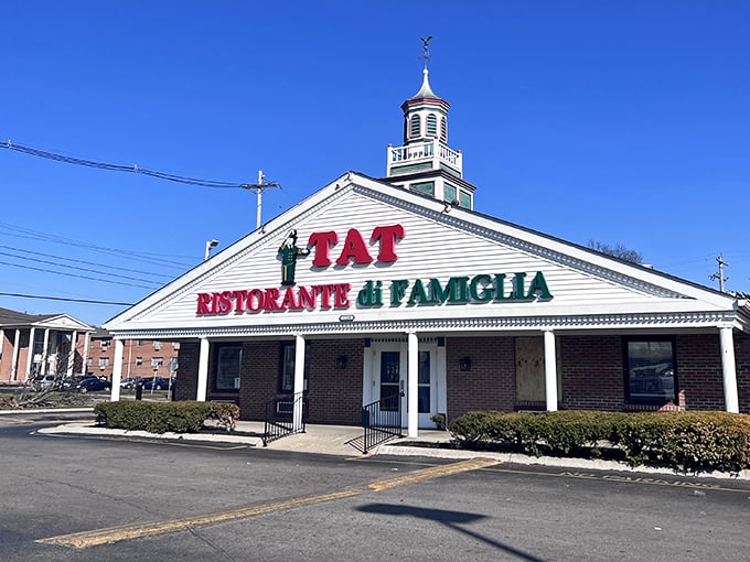 The iconic white building with its distinctive cupola and bold red lettering stands as a Columbus landmark. TAT's exterior promises Italian-American comfort before you even step inside.