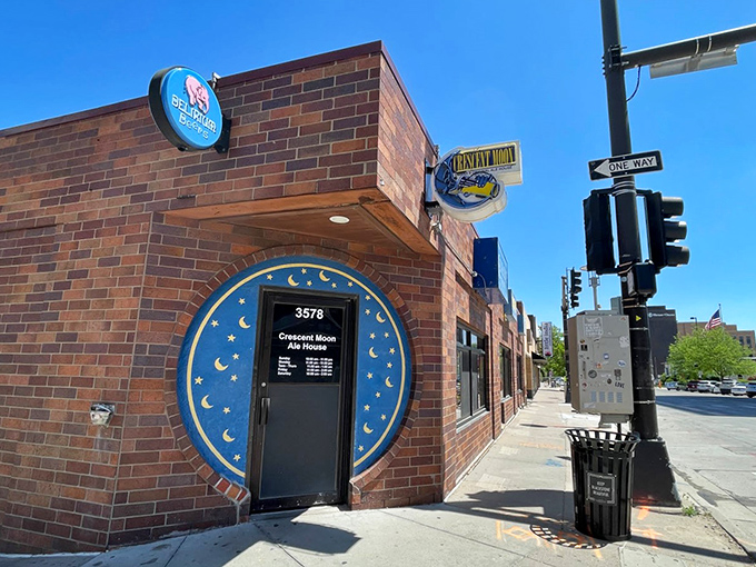 The iconic blue moon doorway beckons hungry travelers like a portal to sandwich paradise. Nebraska's culinary landmark hides in plain sight.