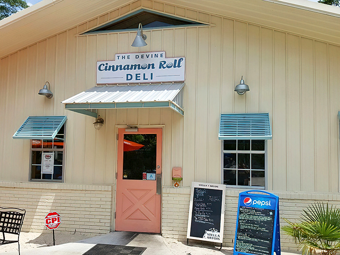 The unassuming beige exterior with its coral-pink door is like that quiet friend who turns out to have the best stories at the party.