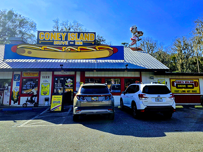 The giant hot dog sign beckons like a neon lighthouse for the hungry. Brooksville's temple to tubular meat awaits!