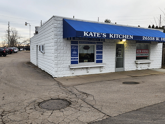 The unassuming exterior of Kate's Kitchen might not stop traffic, but locals know this humble white building houses breakfast magic worth any detour.