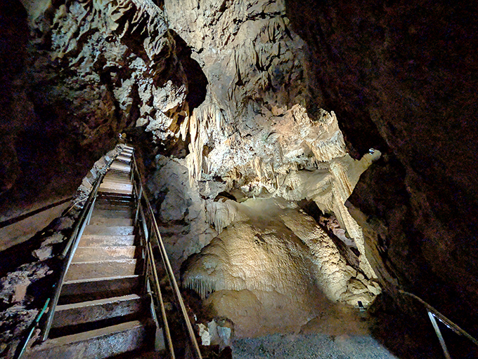 Nature's own chandelier display! These delicate stalactites hang like frozen waterfalls, creating a limestone forest that's been growing one drop at a time for millennia.
