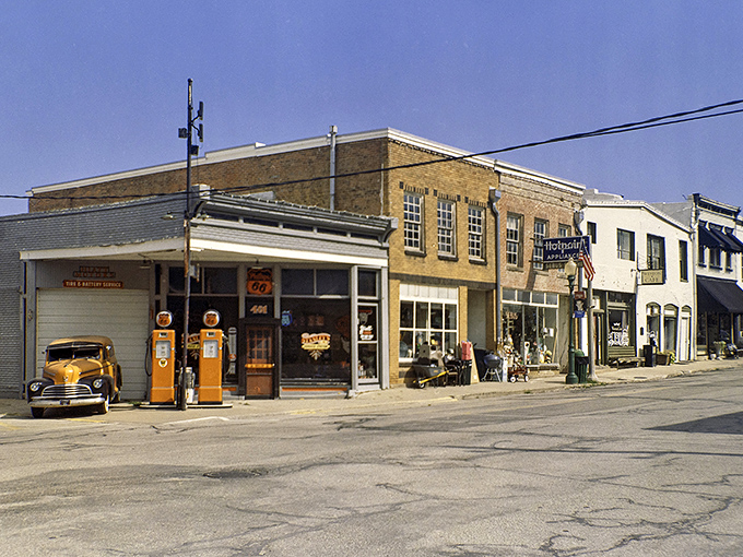 Main Street Weston whispers stories of riverboat days while modern cars line up like patient time travelers waiting their turn.