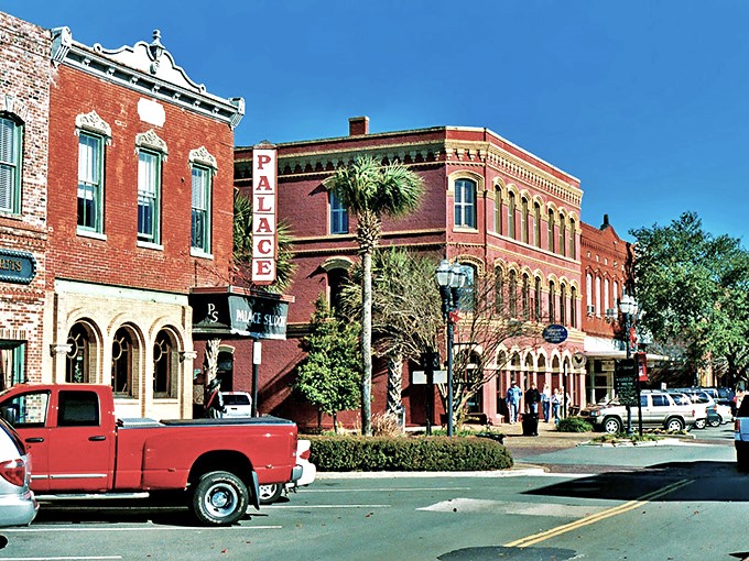 Centre Street's historic facades transport you to a time when architecture had personality and Coca-Cola ads weren't just on your phone screen.