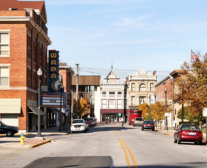Downtown Wapakoneta's historic Wapa Theatre marquee stands like a sentinel of nostalgia, beckoning visitors into a Main Street that time politely decided to respect.