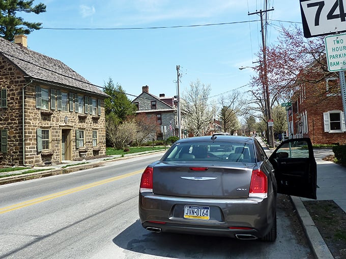 Main Street Strasburg offers that perfect small-town tableau where brick buildings stand like sentinels of simpler times, complete with flowering trees that know exactly when to bloom for tourists.