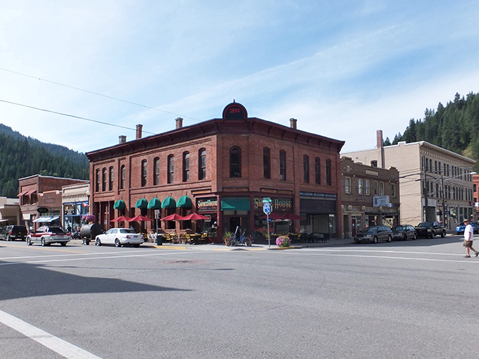 Main Street Wallace stretches toward pine-covered mountains like a Western movie set come to life. History and adventure await at every corner.
