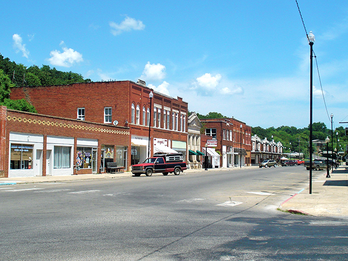 Downtown Pawhuska's historic brick buildings stand like sentinels of another era, their weathered facades telling stories of boom times, quiet decades, and remarkable revival.