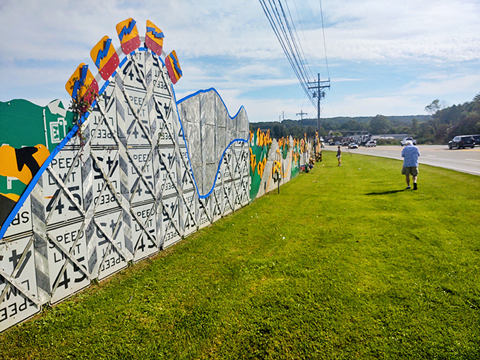 Who knew traffic signs could become such captivating art? This colorful mosaic transforms everyday road markers into a visual symphony that stops you in your tracks&mdash;no red light required.