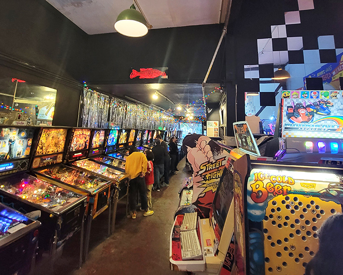 A pinball paradise stretches before you like a neon-lit yellow brick road. Where else can you find this many flippers under one roof?
