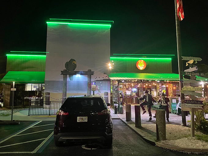 The thatched tiki roof and vibrant green exterior of P.J.'s stands out like a tropical oasis, promising seafood treasures within this Indian Rocks Beach landmark.