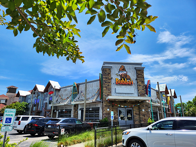 The weathered wooden exterior of Bubba's Fish Shack stands proudly against the Carolina blue sky, promising seafood treasures within those rustic walls.