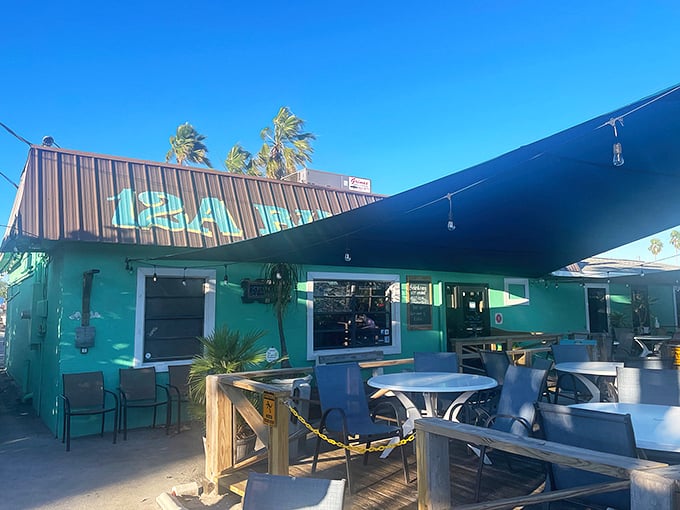 The turquoise exterior of 12A Buoy might not scream "culinary destination," but as any Florida treasure hunter knows, the most unassuming spots often hide the greatest rewards.