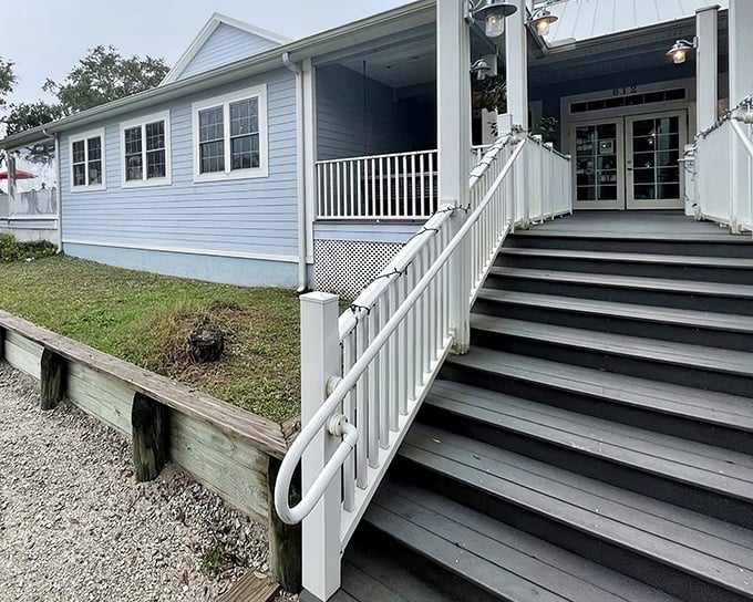 The coastal charm of Aunt Kate's welcomes you with its pale blue exterior and inviting staircase&mdash;Florida's version of a seafood welcome mat.