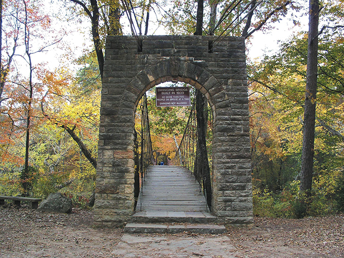 Nature's mirror game at its finest. Tishomingo's lake reflects autumn foliage like a master painter showing off, creating a double dose of Mississippi magic.